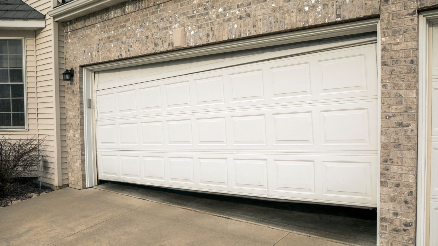 Garage Door Came Off the Tracks: What To Do Next